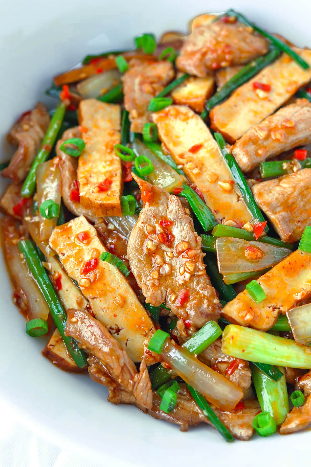 Stir-fried Garlic Scapes with Pork & Tofu - That Spicy Chick