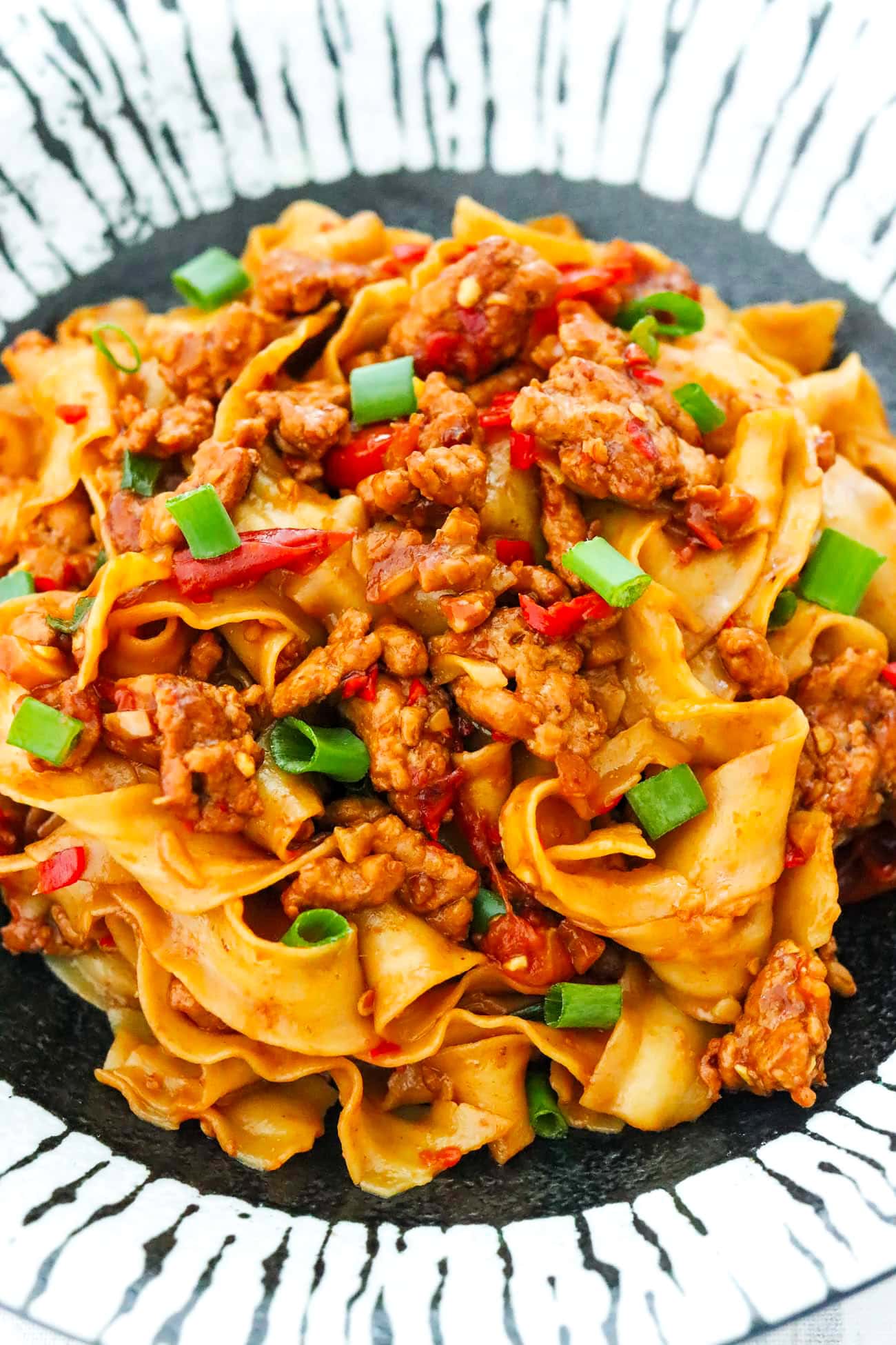 Spicy Pork Knife Cut Noodles (Squiggly Noodles Recipe) - That Spicy Chick